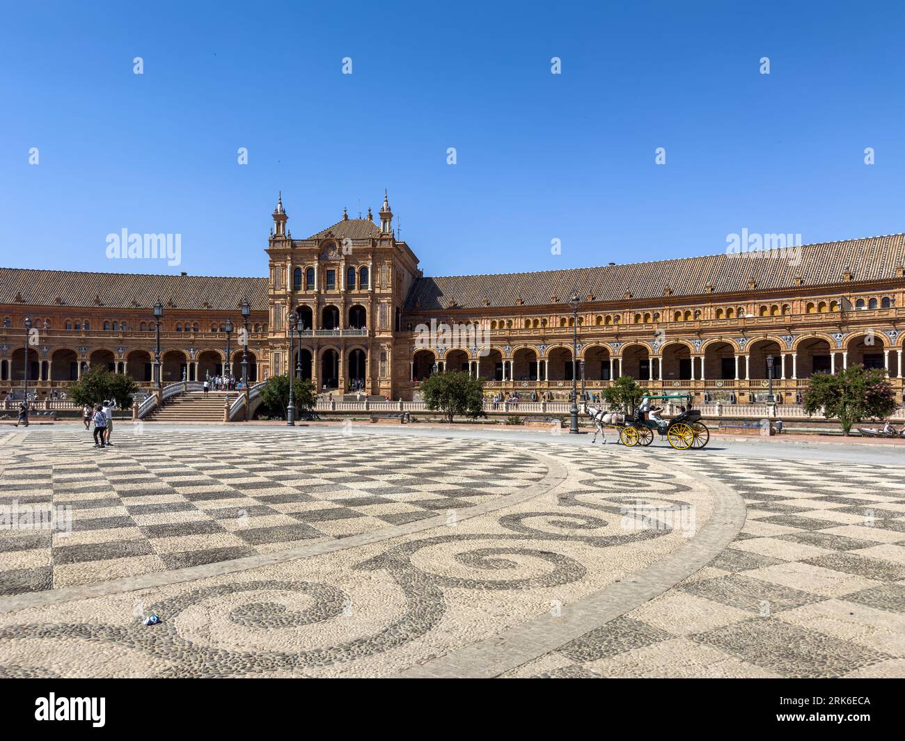 A view of the Plaza de Espana in Seville on a hot spring day. It ...