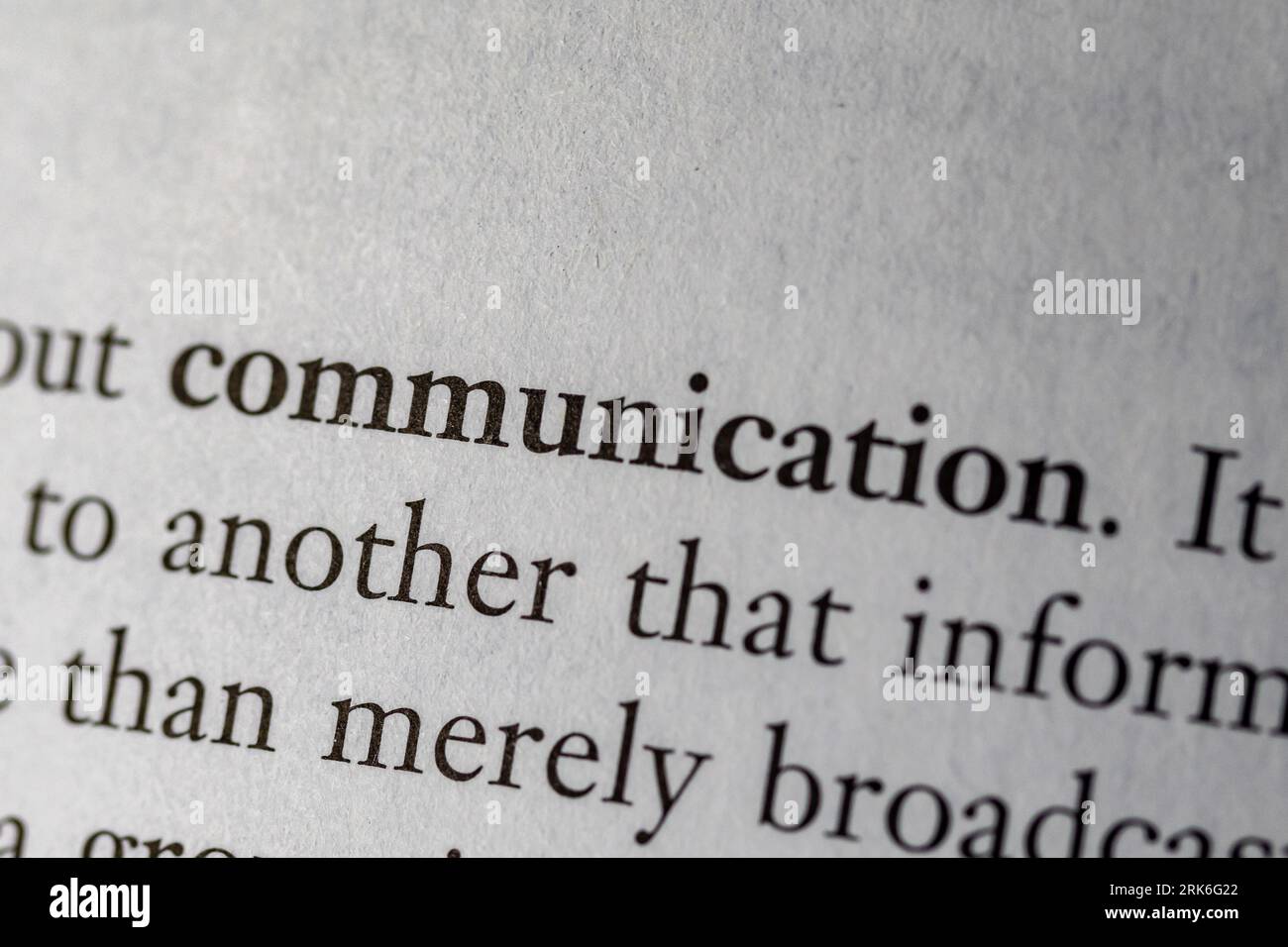 A close-up of a book page showing text related to communication Stock ...