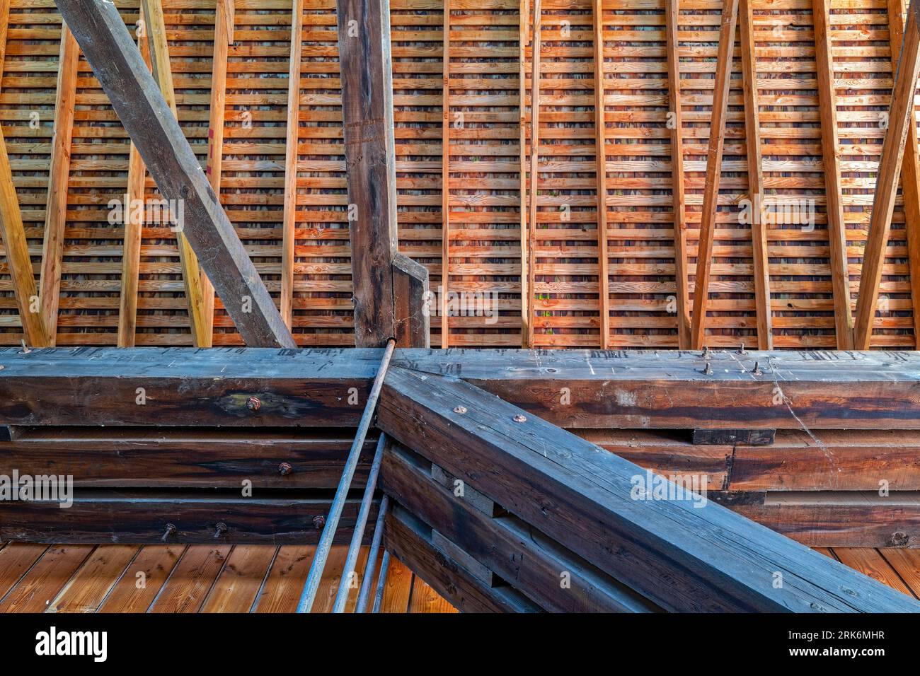 Upward view of ceiling beams of an old covered bridge in Oregon, USA ...