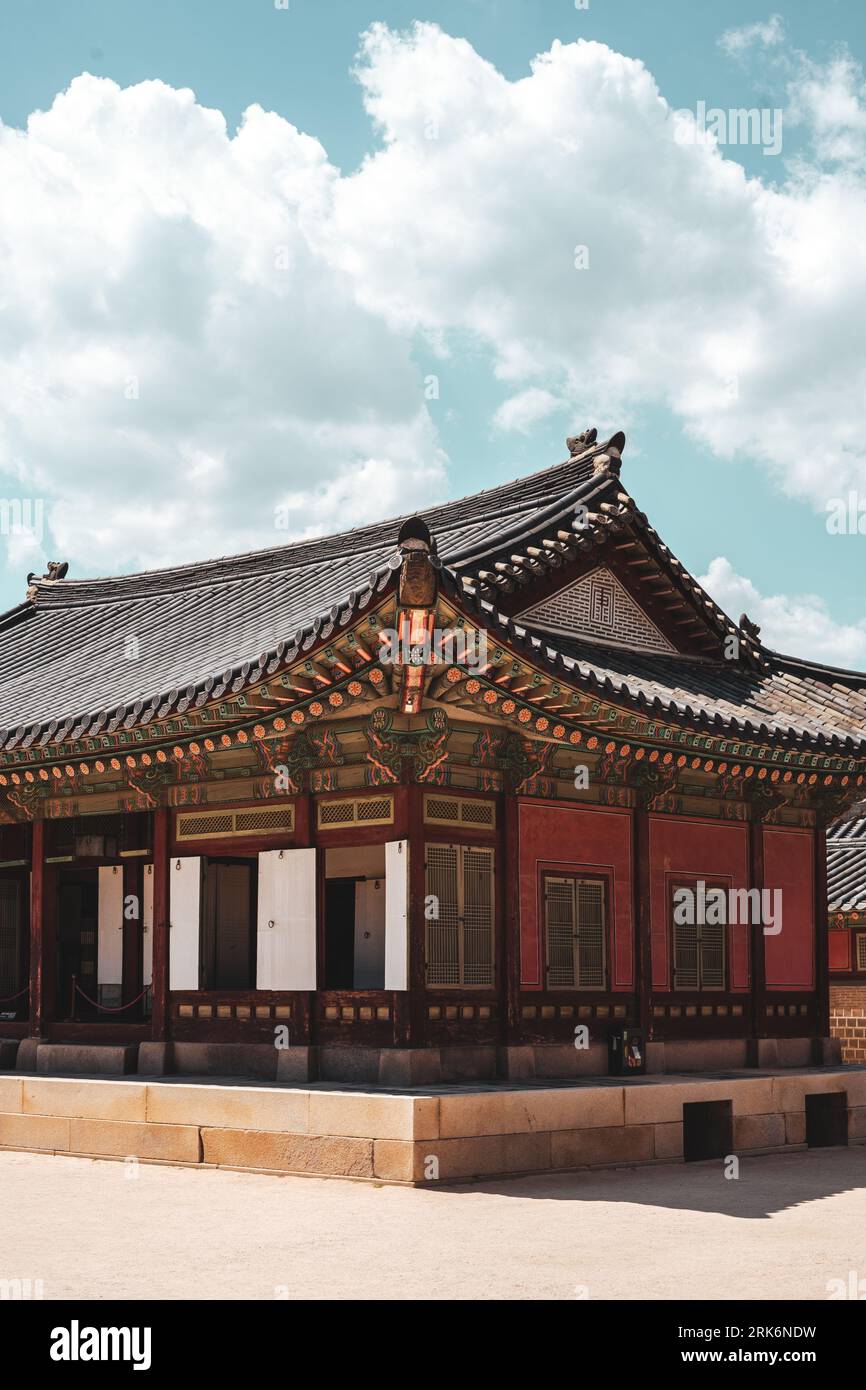 A vertical shot of a traditional Korean building under the sunlight and ...