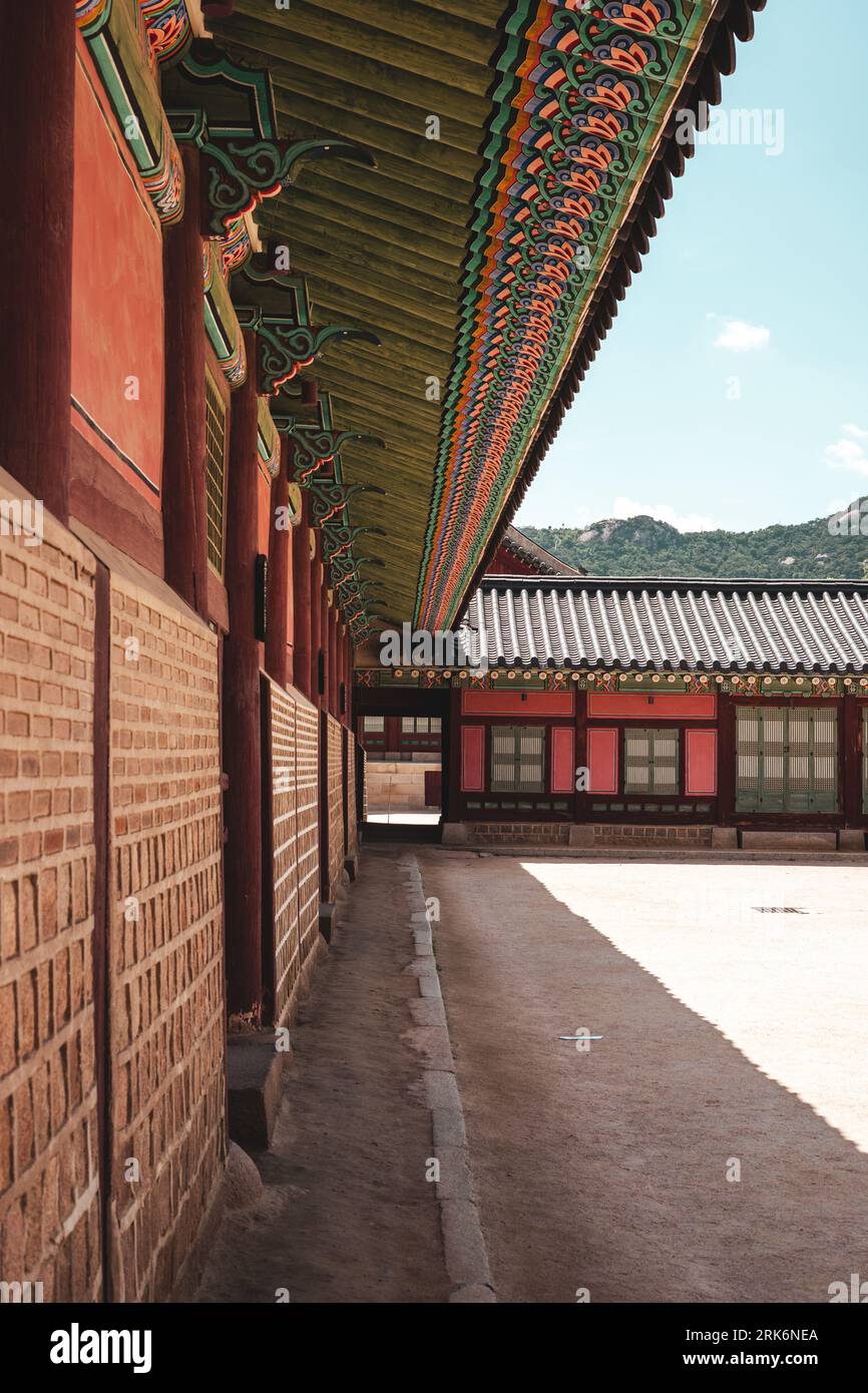 A vertical shot of a traditional Korean building under the sunlight and ...