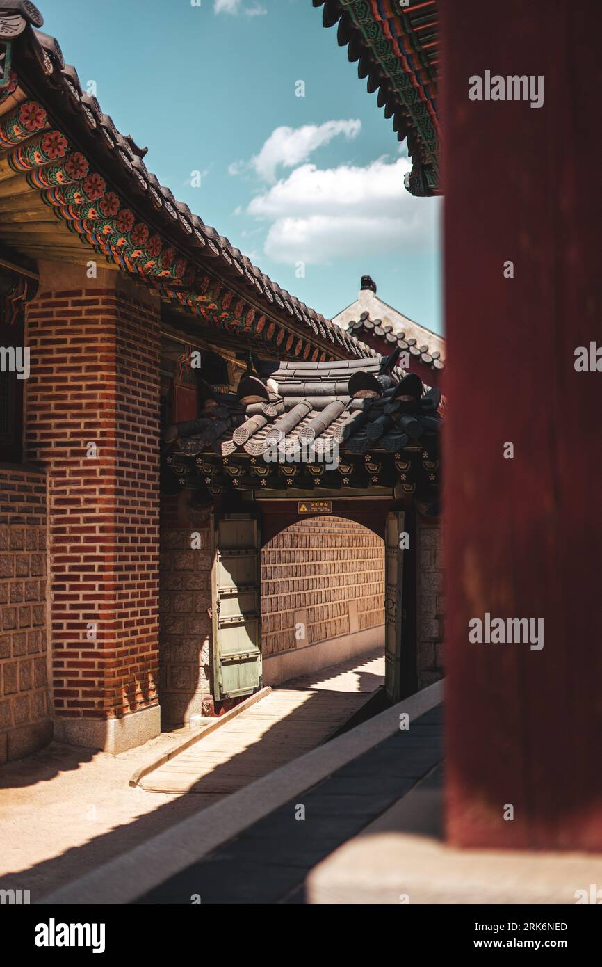 A vertical shot of a traditional Korean building under the sunlight and ...