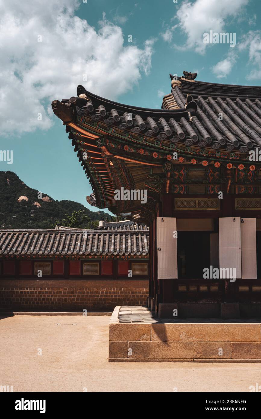A vertical shot of a traditional Korean building under the sunlight and ...