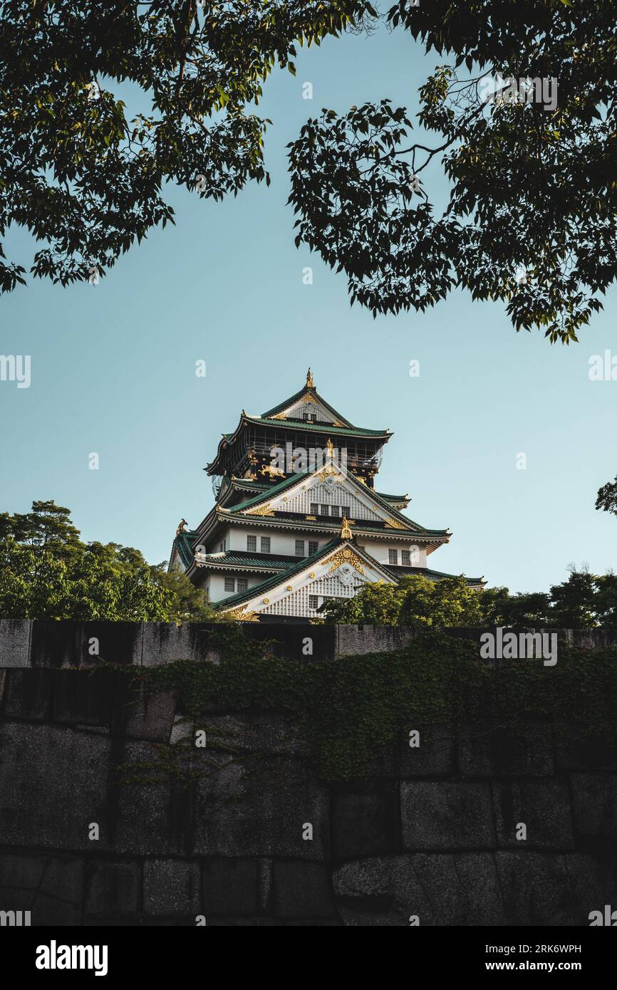 A vertical shot of the Osaka Castle in the daylight in Japan Stock ...