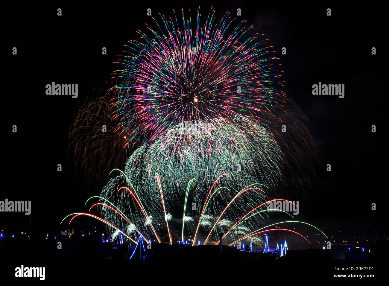 Long exposure shot of a beautiful colourful fireworks display during ...