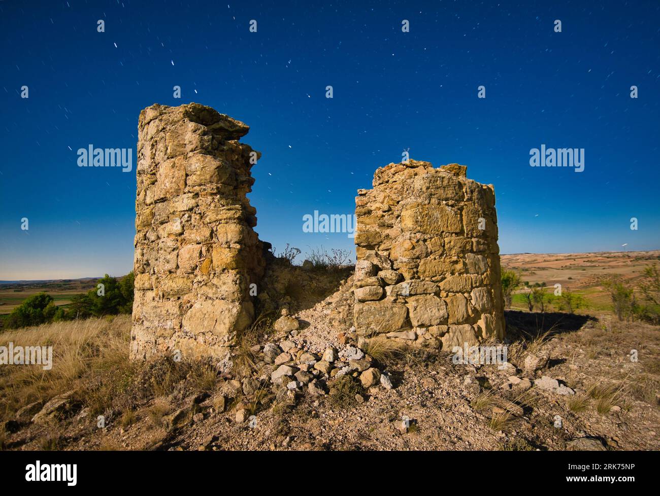 An ancient, ruined brick structure at nighttime Stock Photo - Alamy