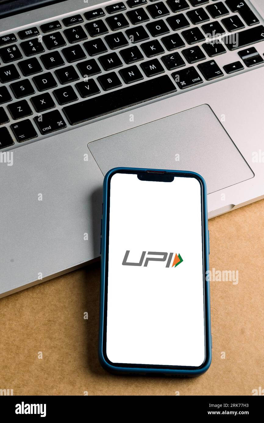 A modern smartphone displaying the UPI logo, a payment system used in ...