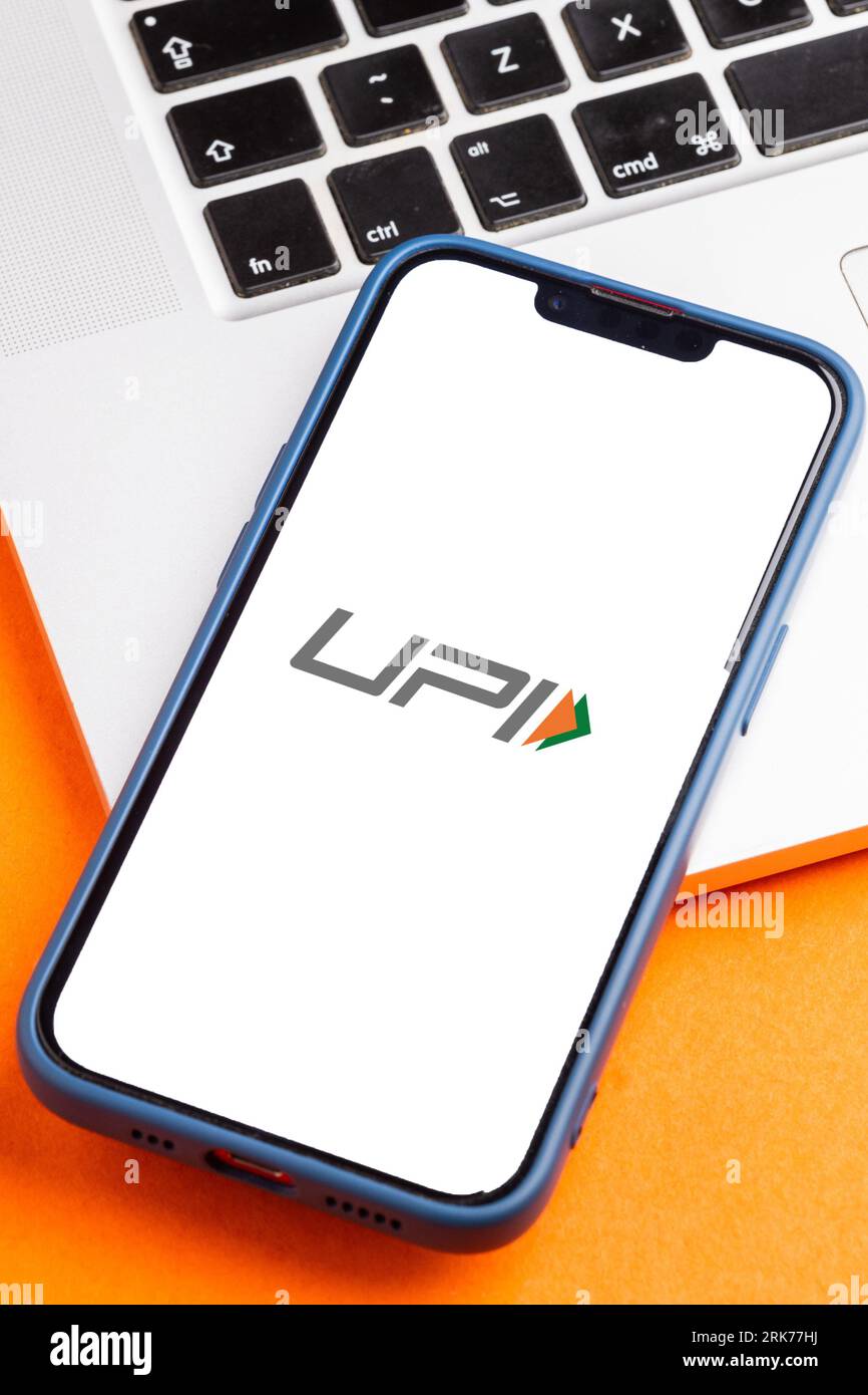 A modern smartphone displaying the UPI logo, a payment system used in ...