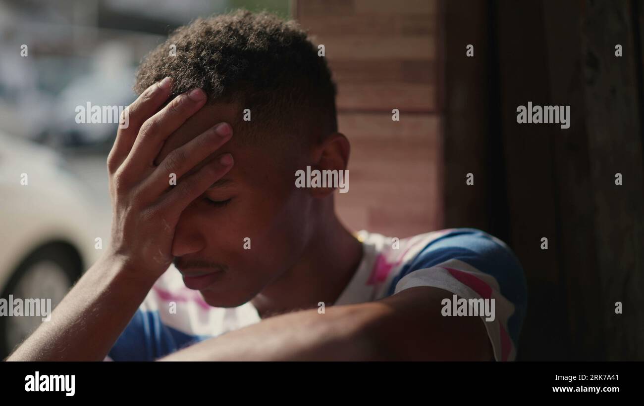 Close-up Face of Distressed Young African American Man, Frowning with ...