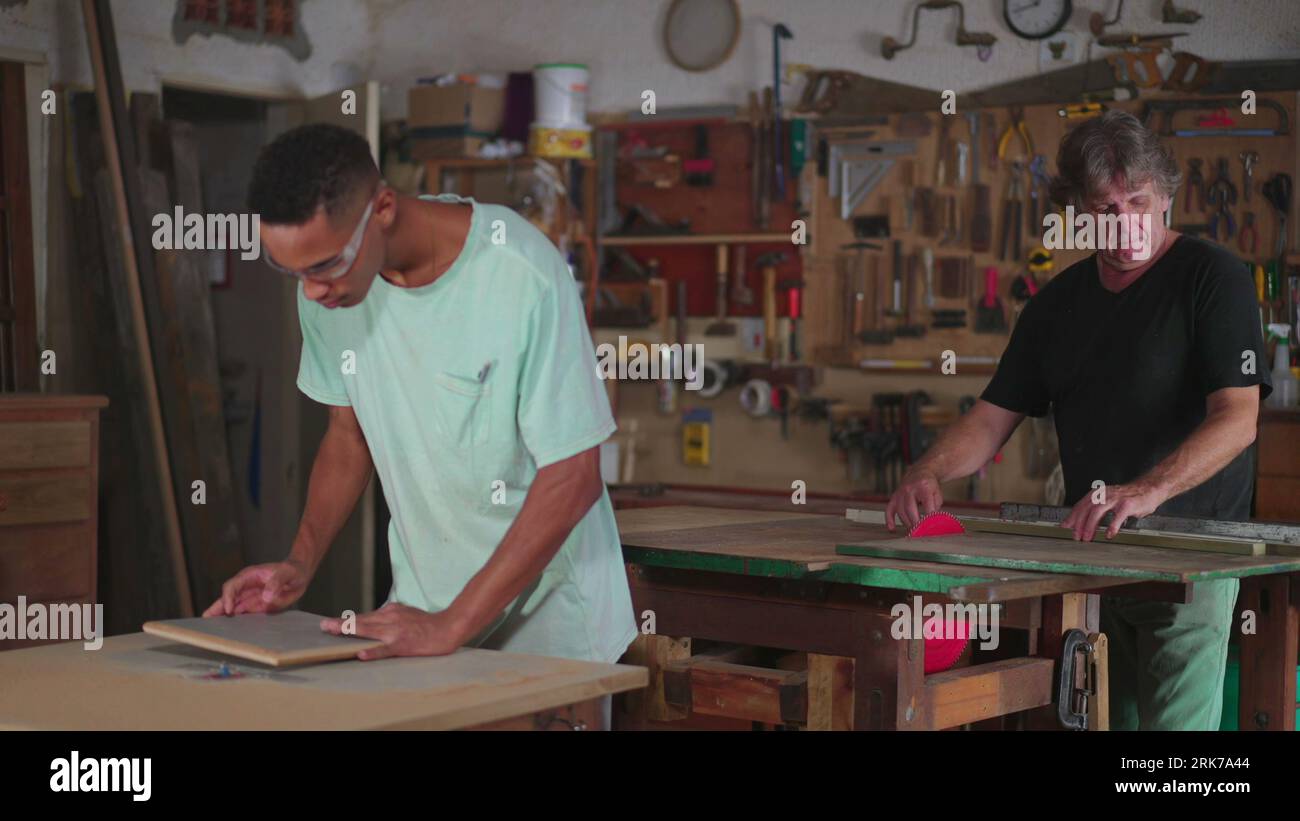 Candid scene carpenters working hi-res stock photography and images - Alamy