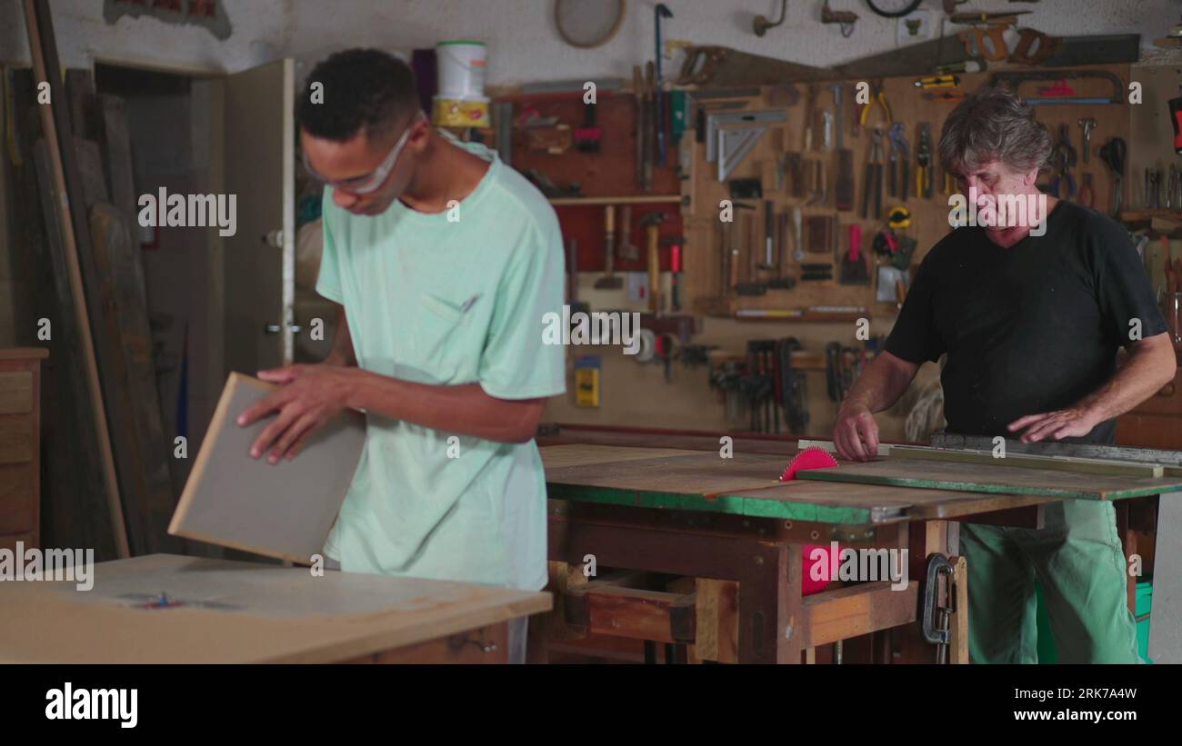 Candid scene carpenters working hi-res stock photography and images - Alamy