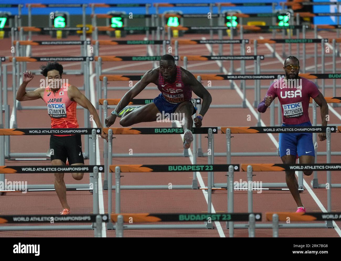 Shunsuke IZUMIYA of JAP , Grant HOLLOWAY of USA and Freddie CRITTENDEN ...