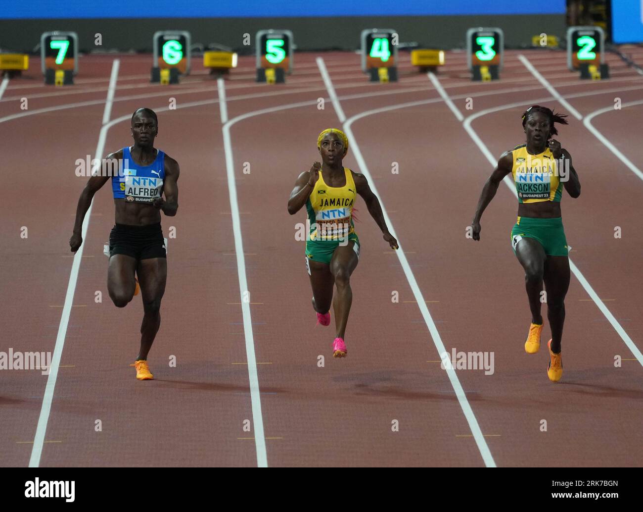 Julien ALFRED of LCA , Shelly-Ann FRASER-PRYCE , Shericka JACKSON of ...