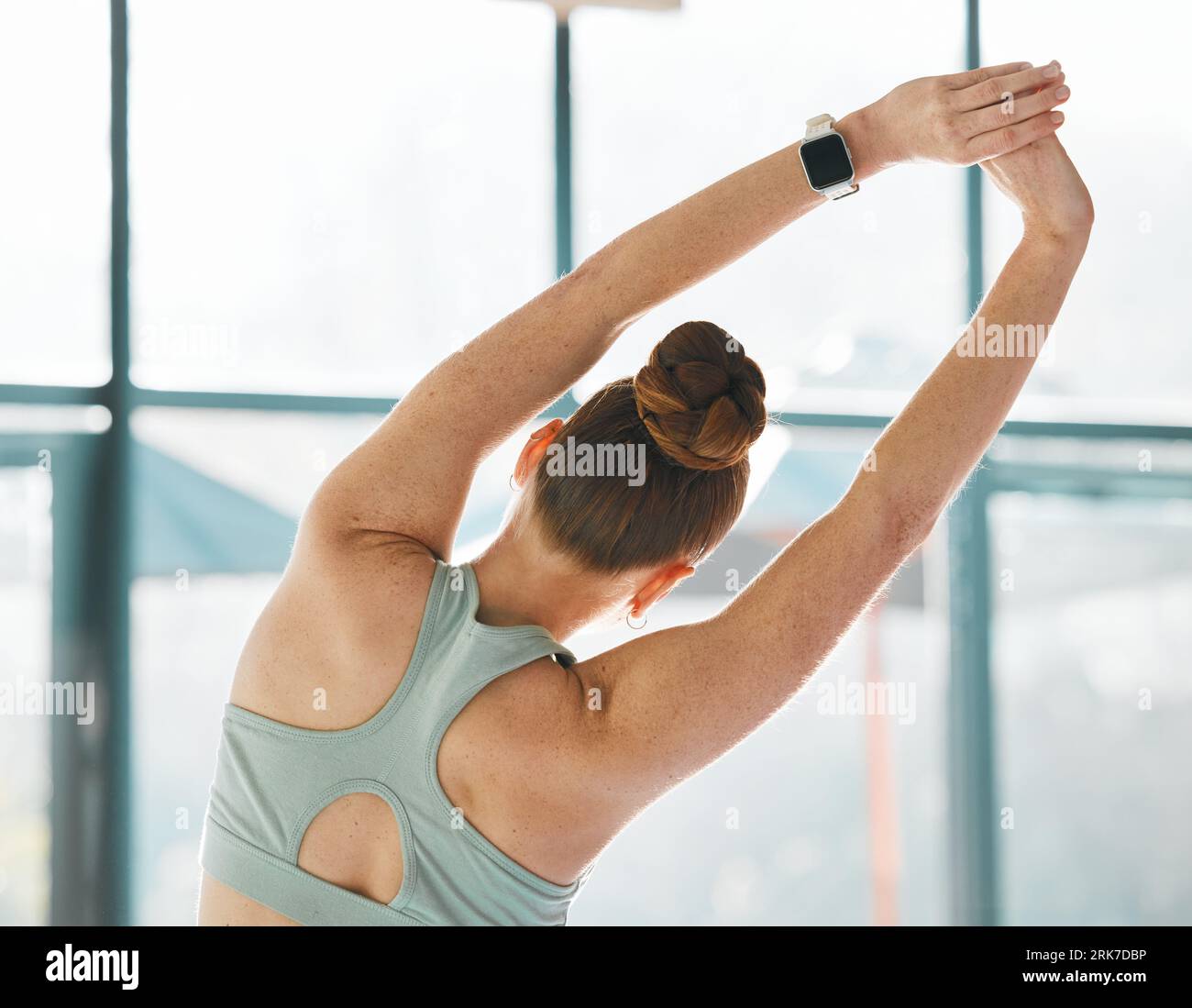 Gym, woman or athlete stretching back or ready to start gymnastics ...