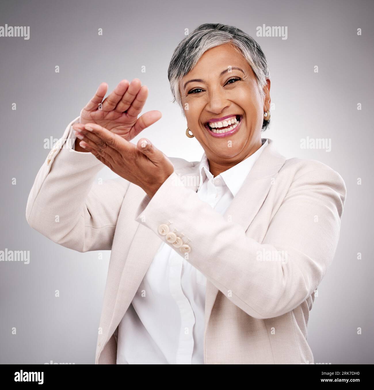 Happy, money gesture and portrait of woman in studio with cashback ...