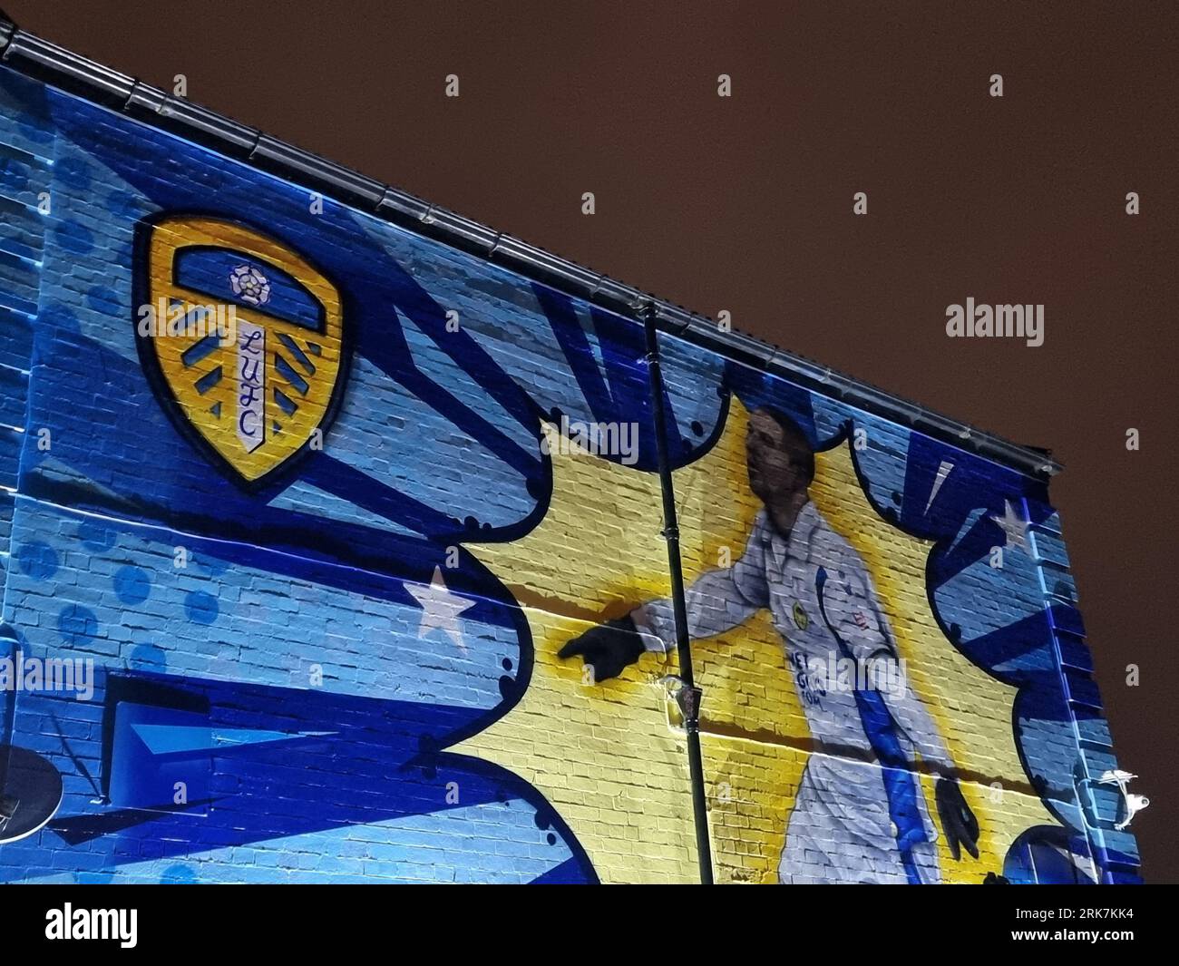 A vibrant wall mural of United legend Jermaine Beckford located at The ...