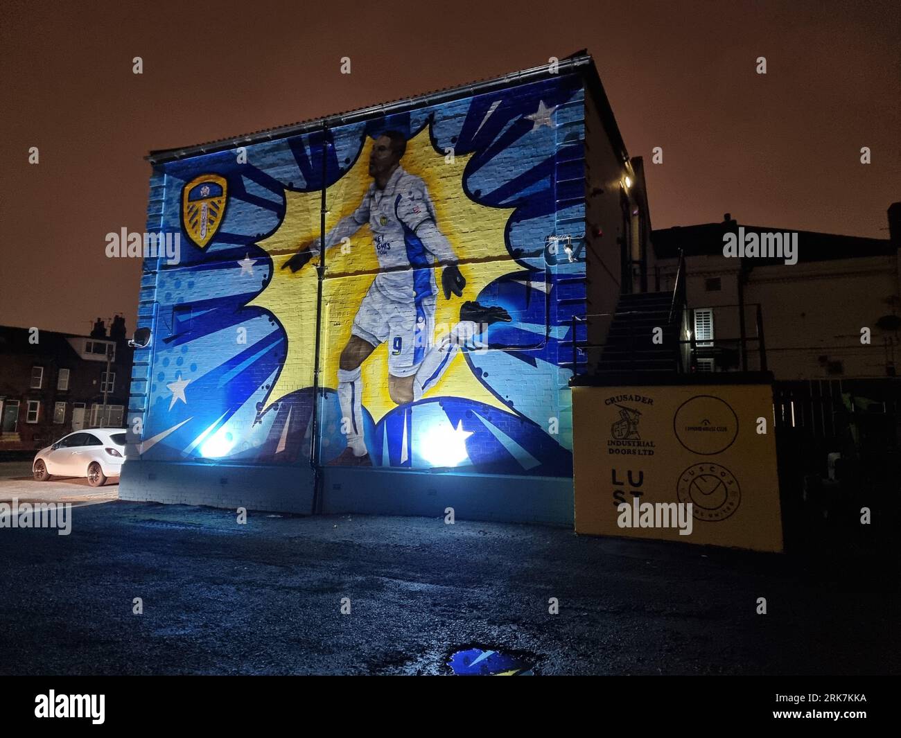 A vibrant wall mural of United legend Jermaine Beckford located at The ...