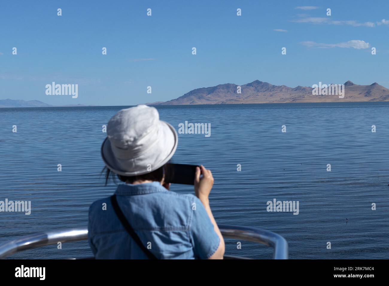Woman taking picture from behind hi-res stock photography and images ...