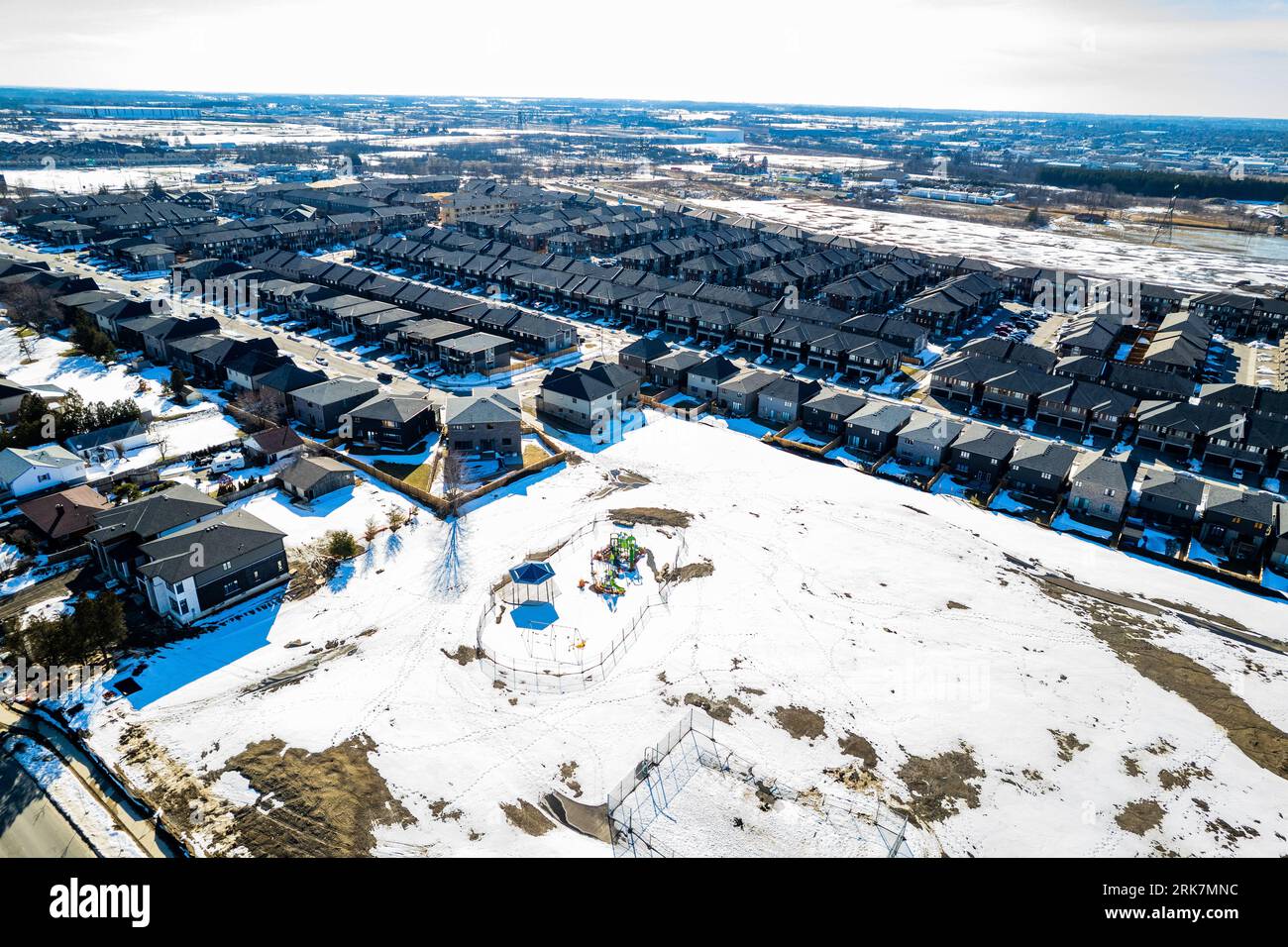 An aerial view of a residential area of a suburban neighborhood with ...