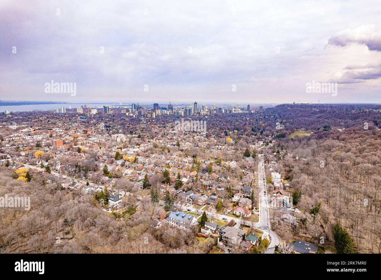 An aerial view of a vibrant urban skyline with high-rise buildings on a ...