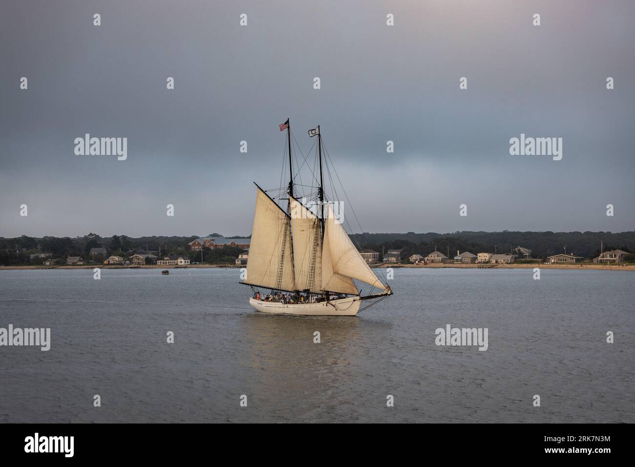 A vintage wooden schooner sailing across the waters near Martha's ...