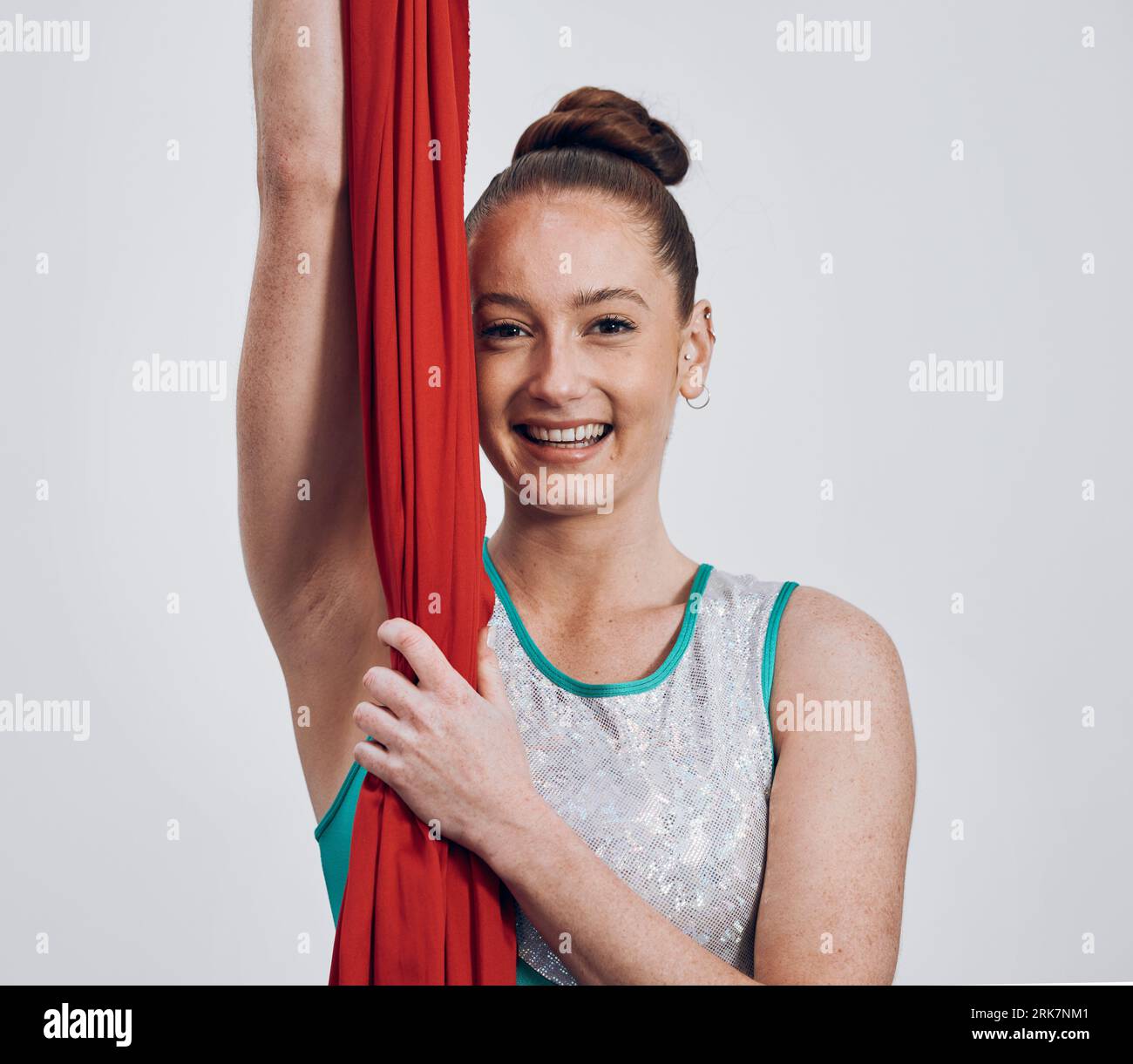 Portrait, ribbon dancer and competition with a woman in studio on a ...