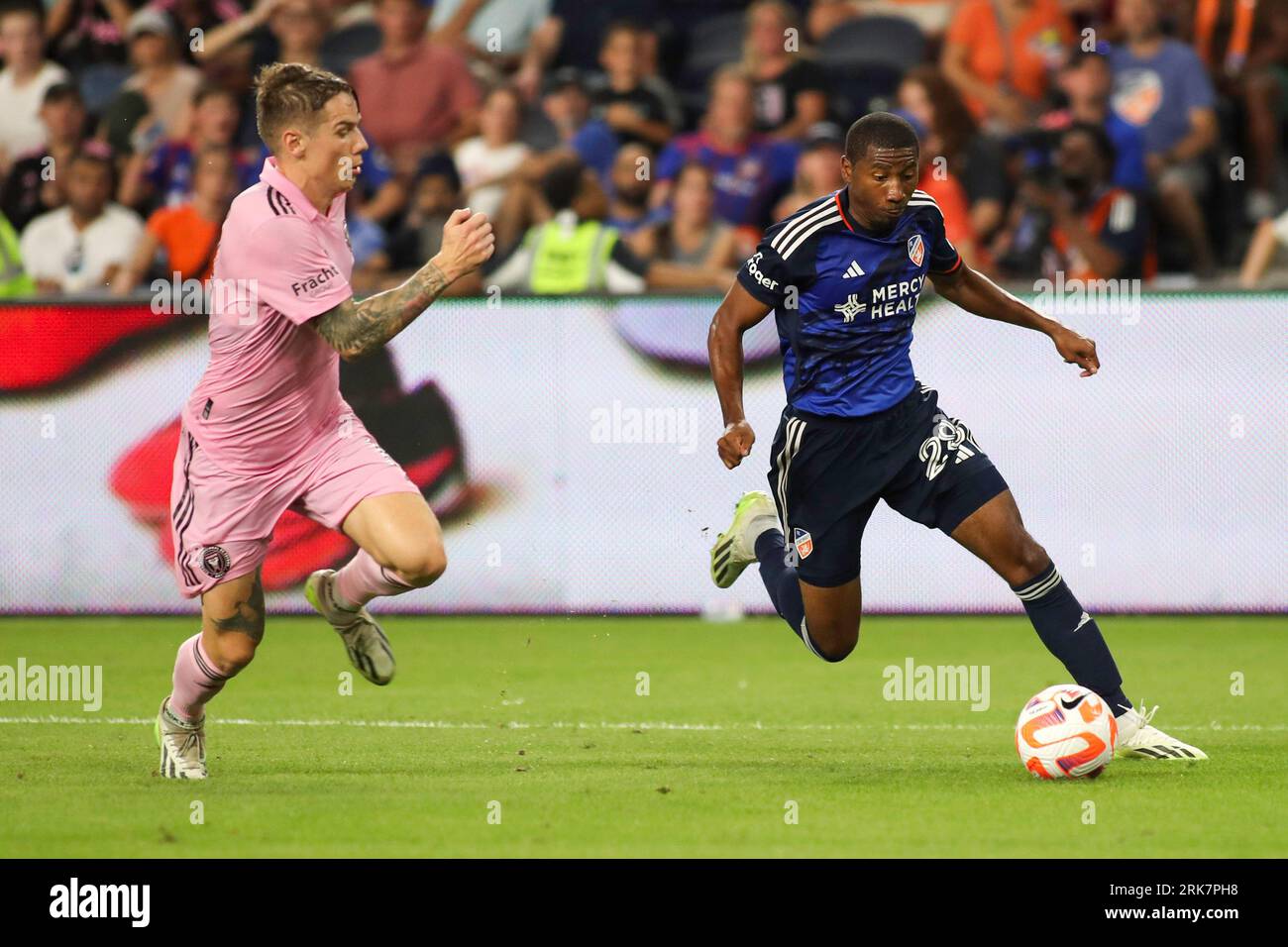 August 23, 2023: FC Cincinnati's CJ Dos Santos (right) plays the ball ...