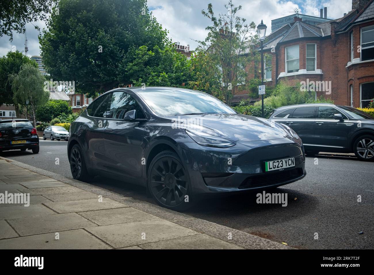 LONDON- JULY 11, 2023: Tesla Model Y parked on suburban British street ...
