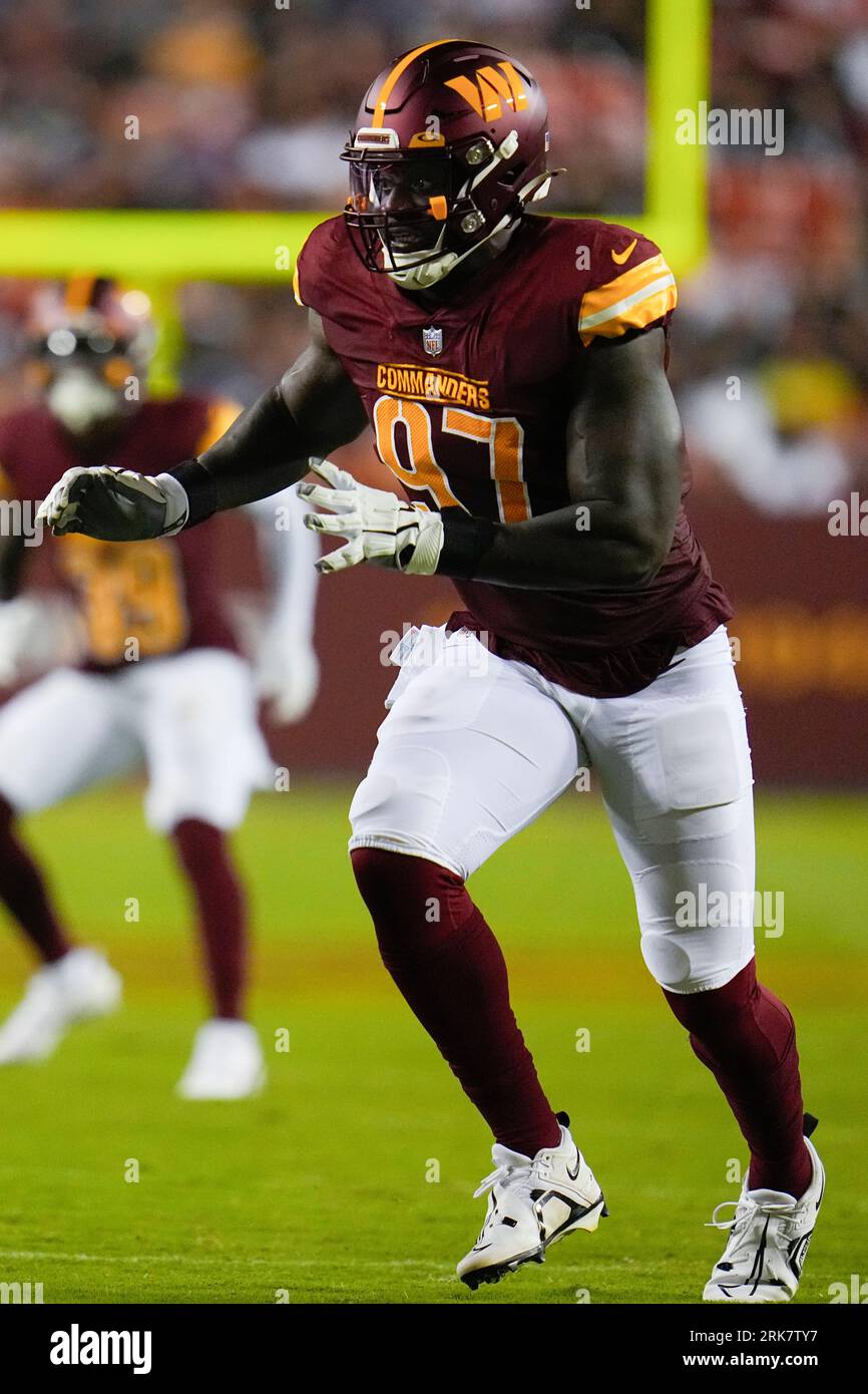 Washington Commanders defensive end Efe Obada (97) rushes in during the ...