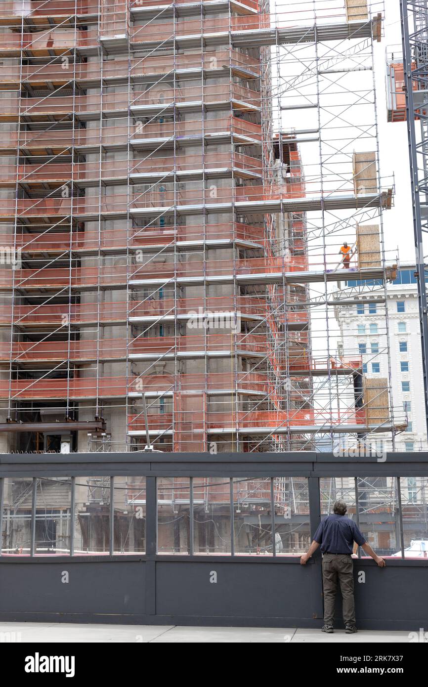 A man viewing the renovation work of the Mormon Temple in Temple Square ...