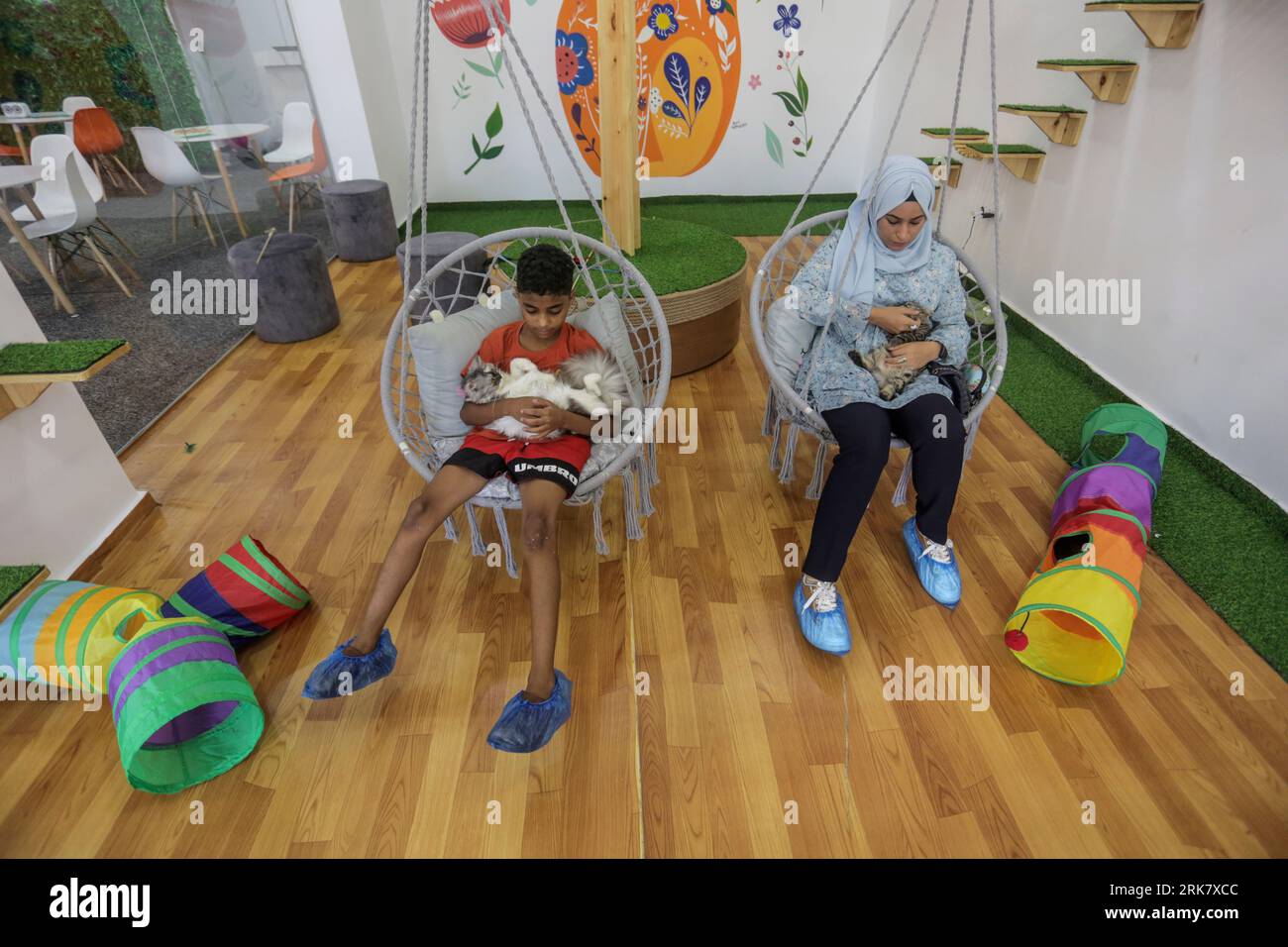 Gaza, Palestine. 24th Aug, 2023. Palestinians enjoy their time in a ...