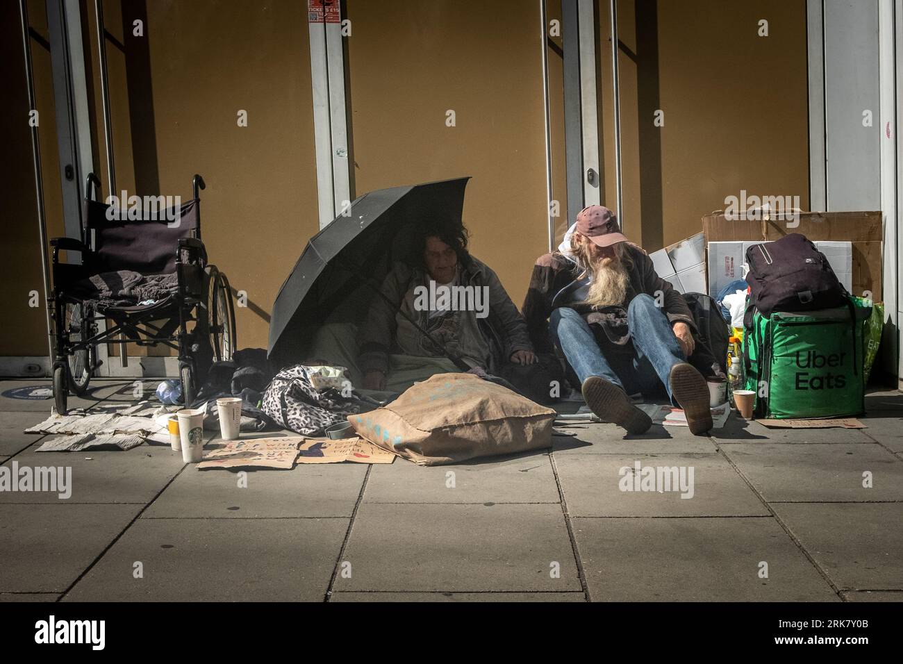 LONDON- JULY 25, 2023: Homeless people sitting on the floor on Oxford ...
