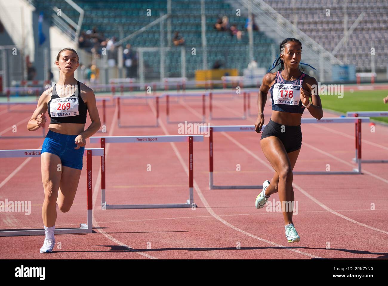 The female hurdlers show off their agility and strength at the Greek ...