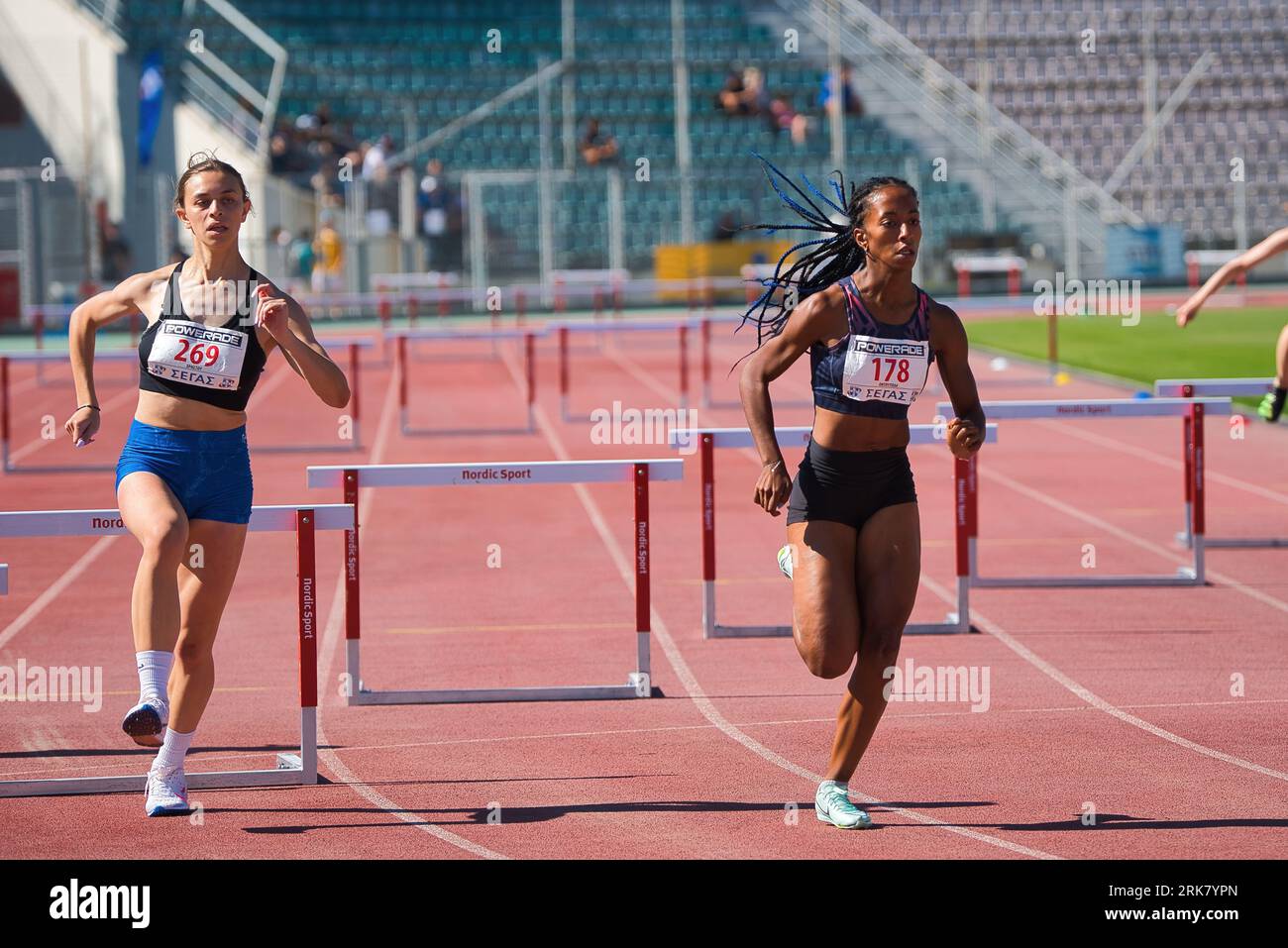 The female hurdlers show off their agility and strength at the Greek ...