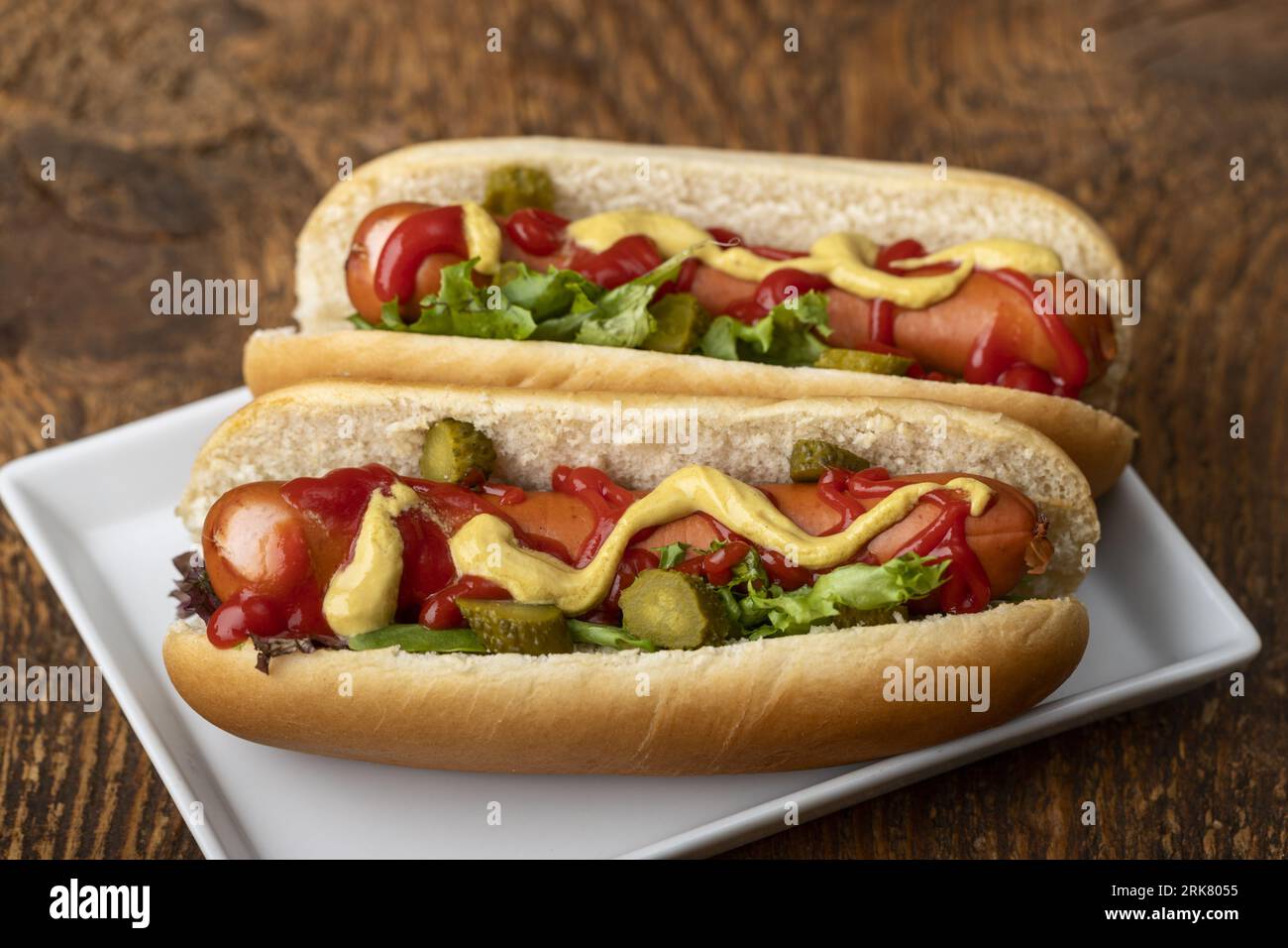 Two Classic Hot Dogs In Buns Stock Photo - Alamy