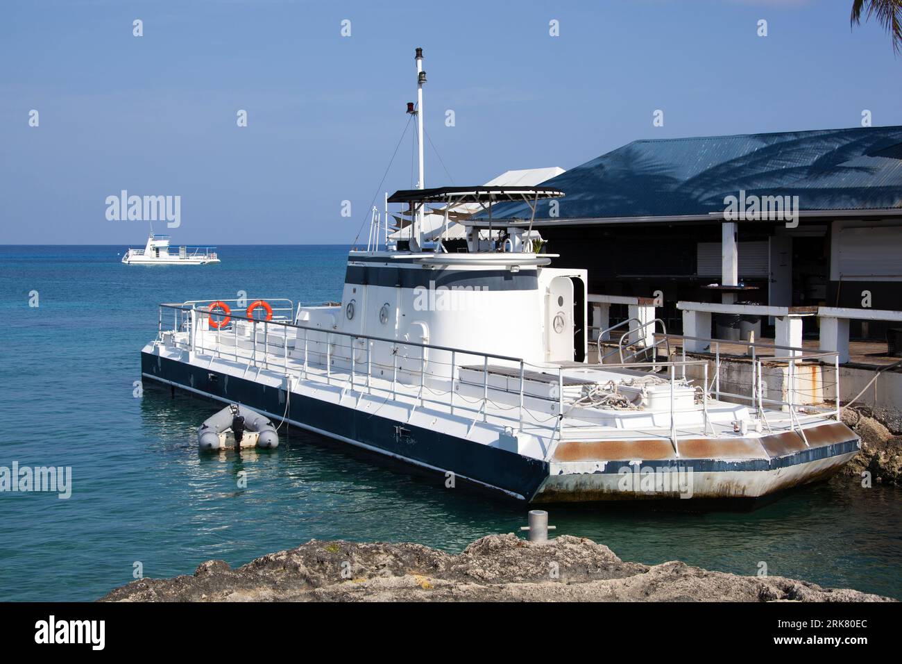 The view of little submarines for tourists to explore underwater in ...