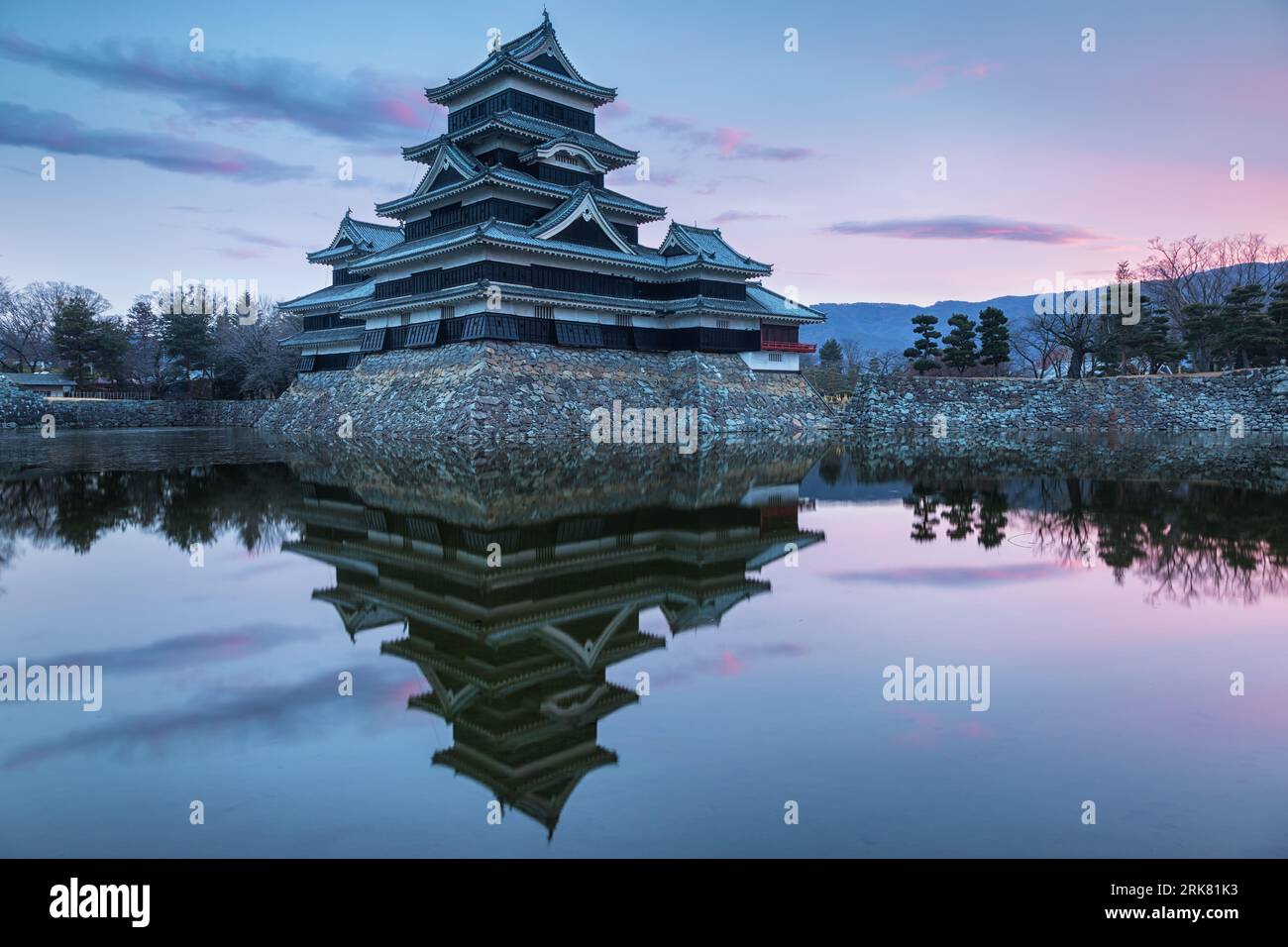 Before sunrise there is colour in the sky behind Matsumoto Castle in ...