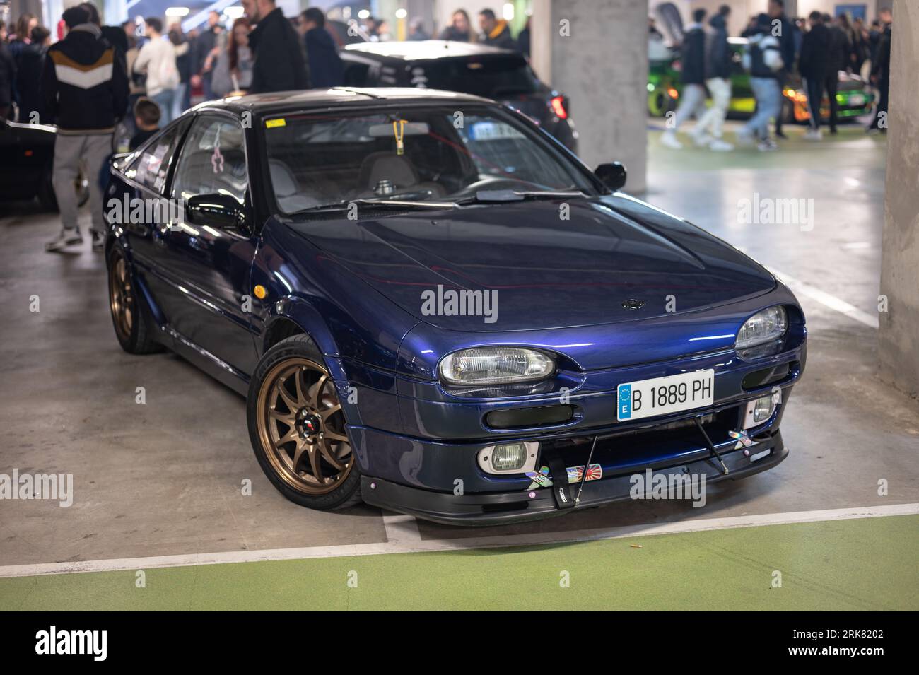 Front view of a small classic Japanese sports car, the Nissan 100NX in ...