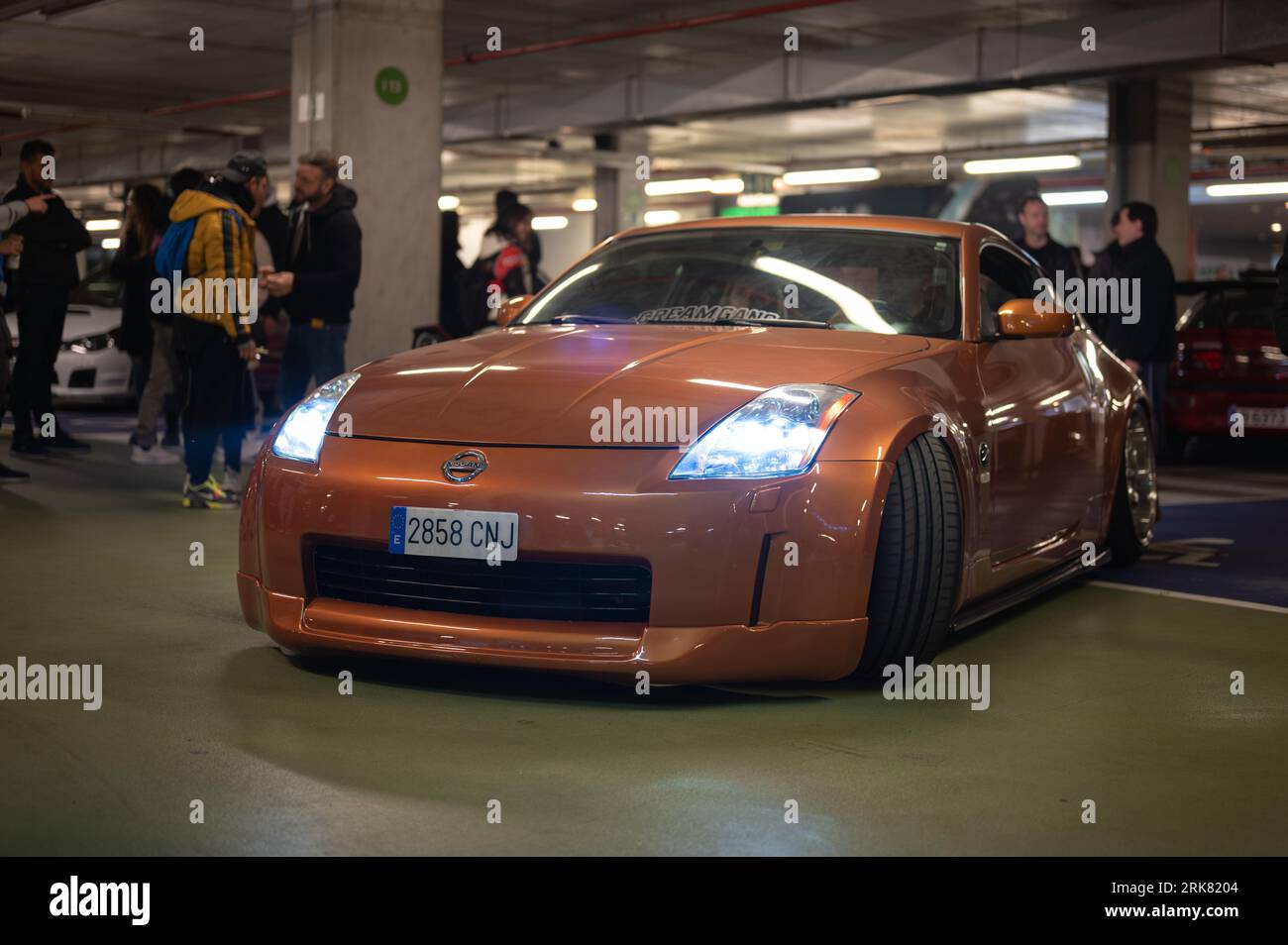 Detail of the beautiful, famous and iconic Nissan 350Z in orange color ...
