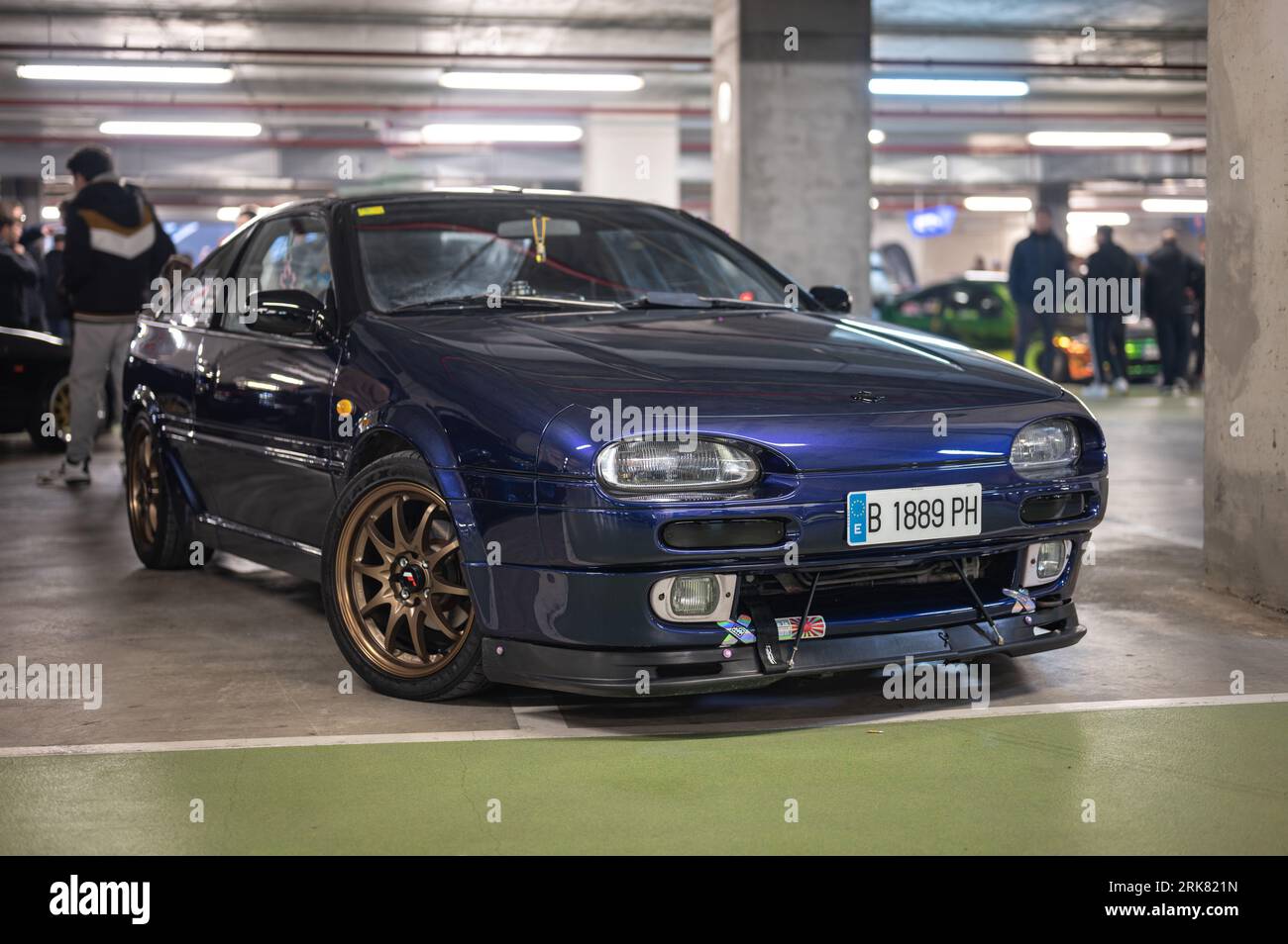 Front view of a small classic Japanese sports car, the Nissan 100NX in ...