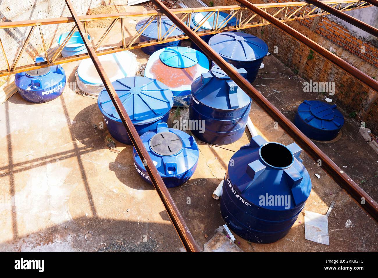 Top view of blue water tanks in the building store Stock Photo - Alamy