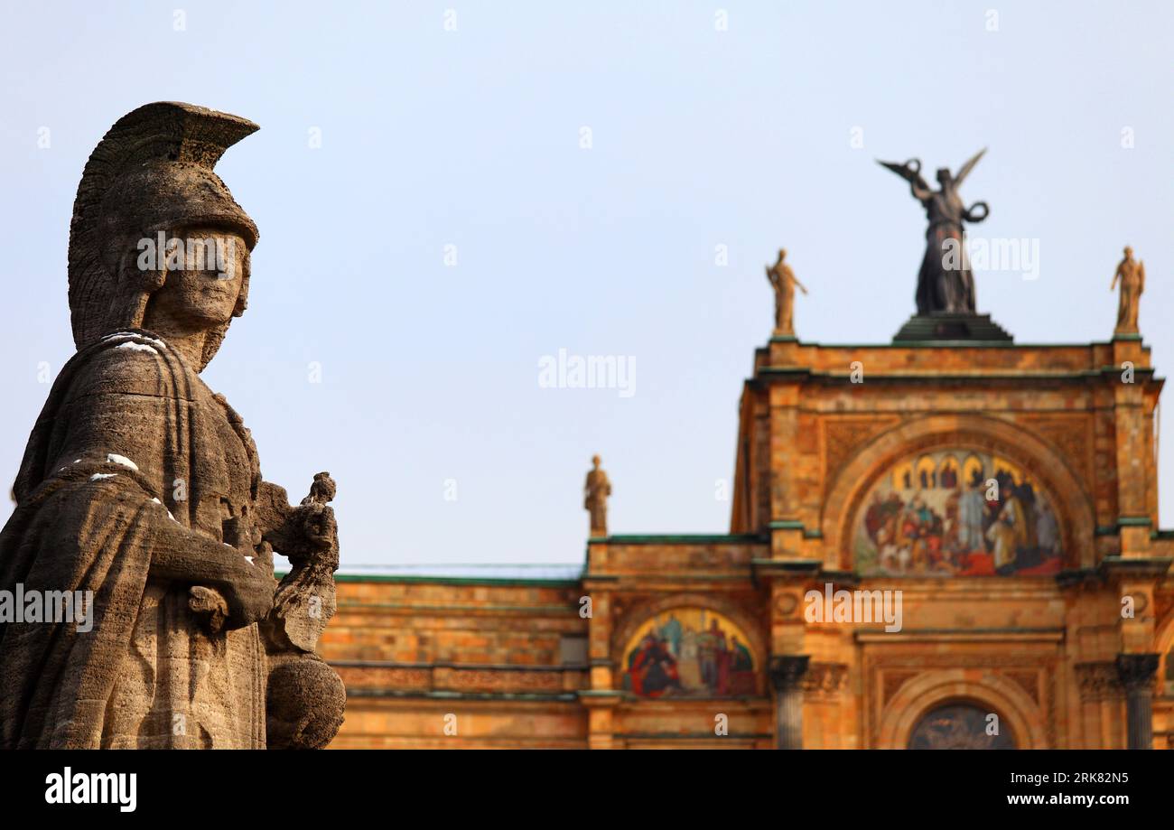 The Maximilian bridge in Munich, Germany is adorned with the statue of ...