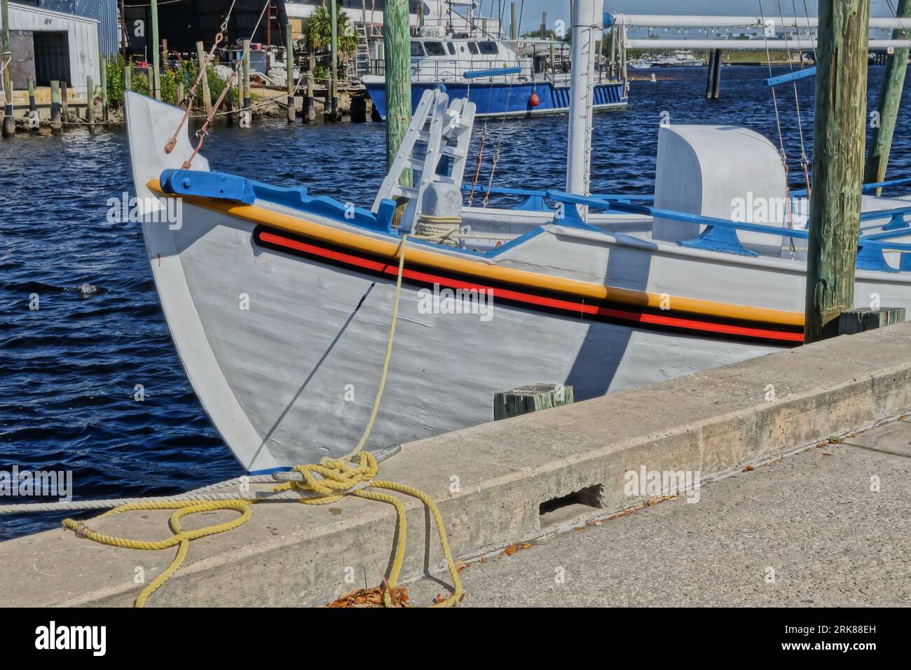 A traditional sponge fishing boat sits docked at the harbor in Tarpon ...