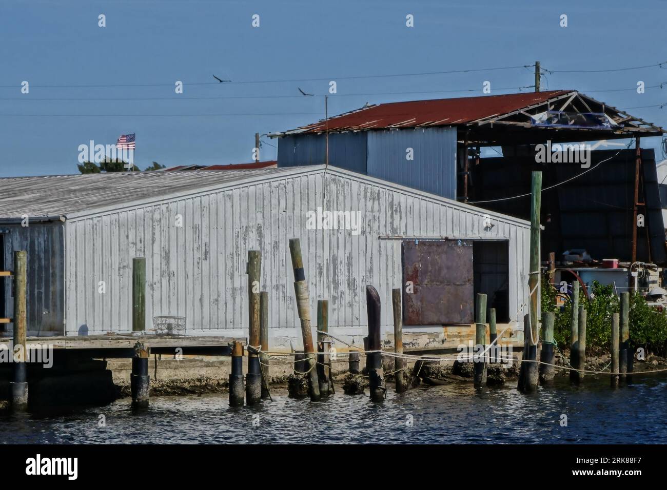 An Old metal warehouse & dock by the harbor in Tarpon Springs, Florida ...