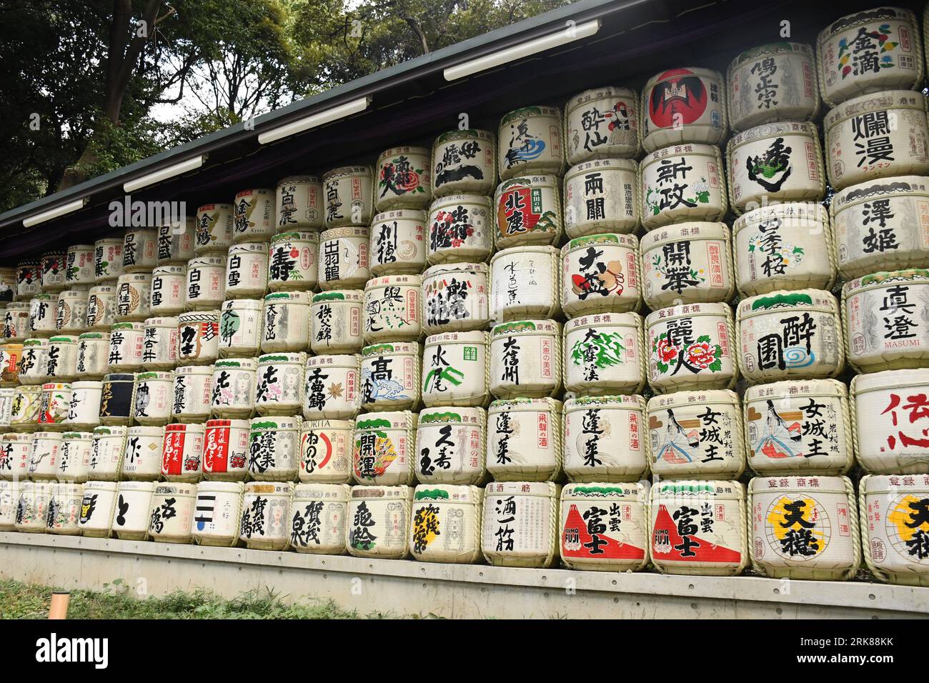 The Meiji Jingu Shrine sake barrels at the entrance of a famous ...