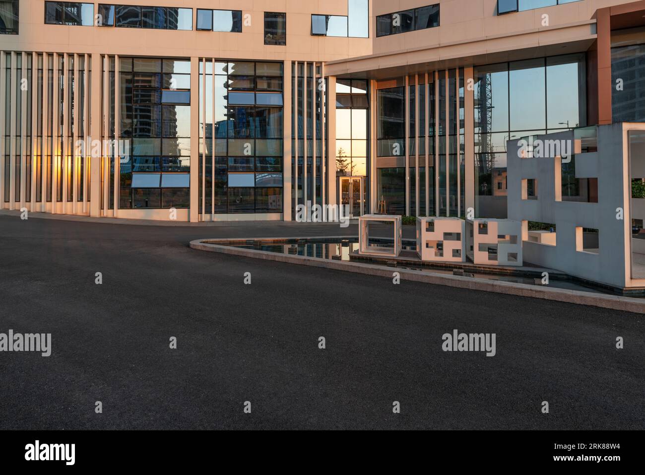 Empty parking lot against buildings hi-res stock photography and images ...