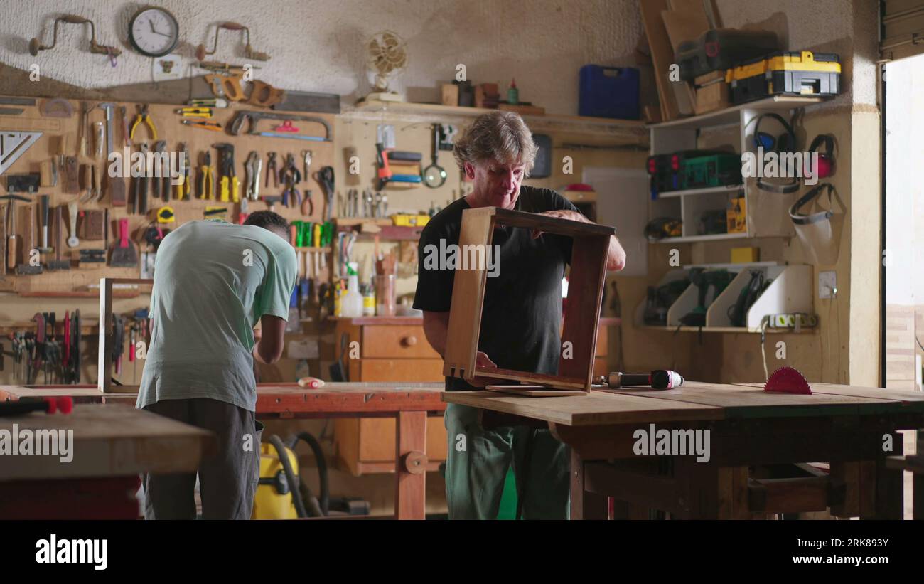 Wood work craftsmanship scene of carpenters working. Carpentry workshop ...