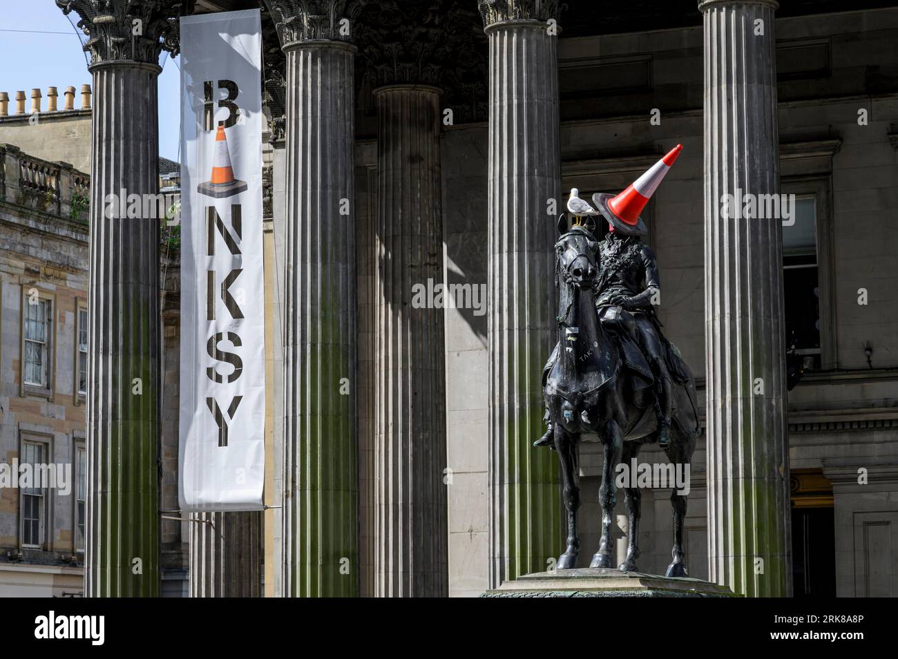 Banksy banner banners hi-res stock photography and images - Alamy