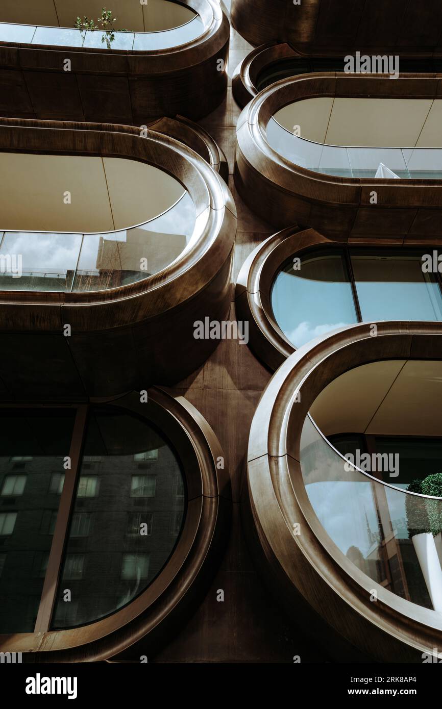 A high-rise structure with an abundance of glass windows on its ...