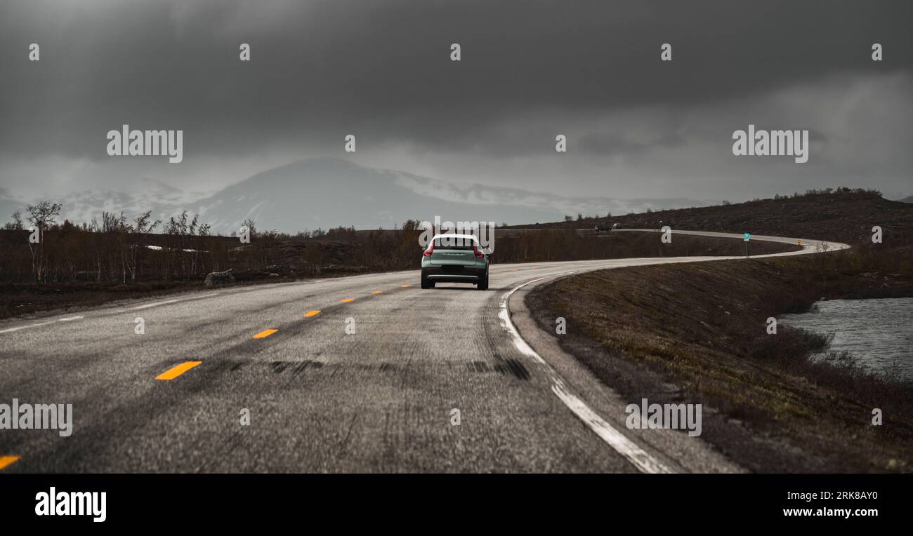 Driving on windy road cloudy hi-res stock photography and images - Alamy